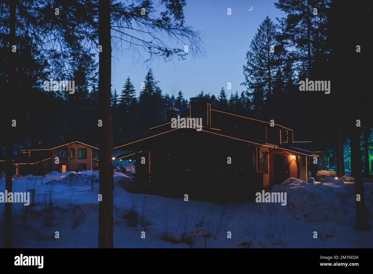 View of a cozy wooden scandinavian cabin cottage chalet house covered ...