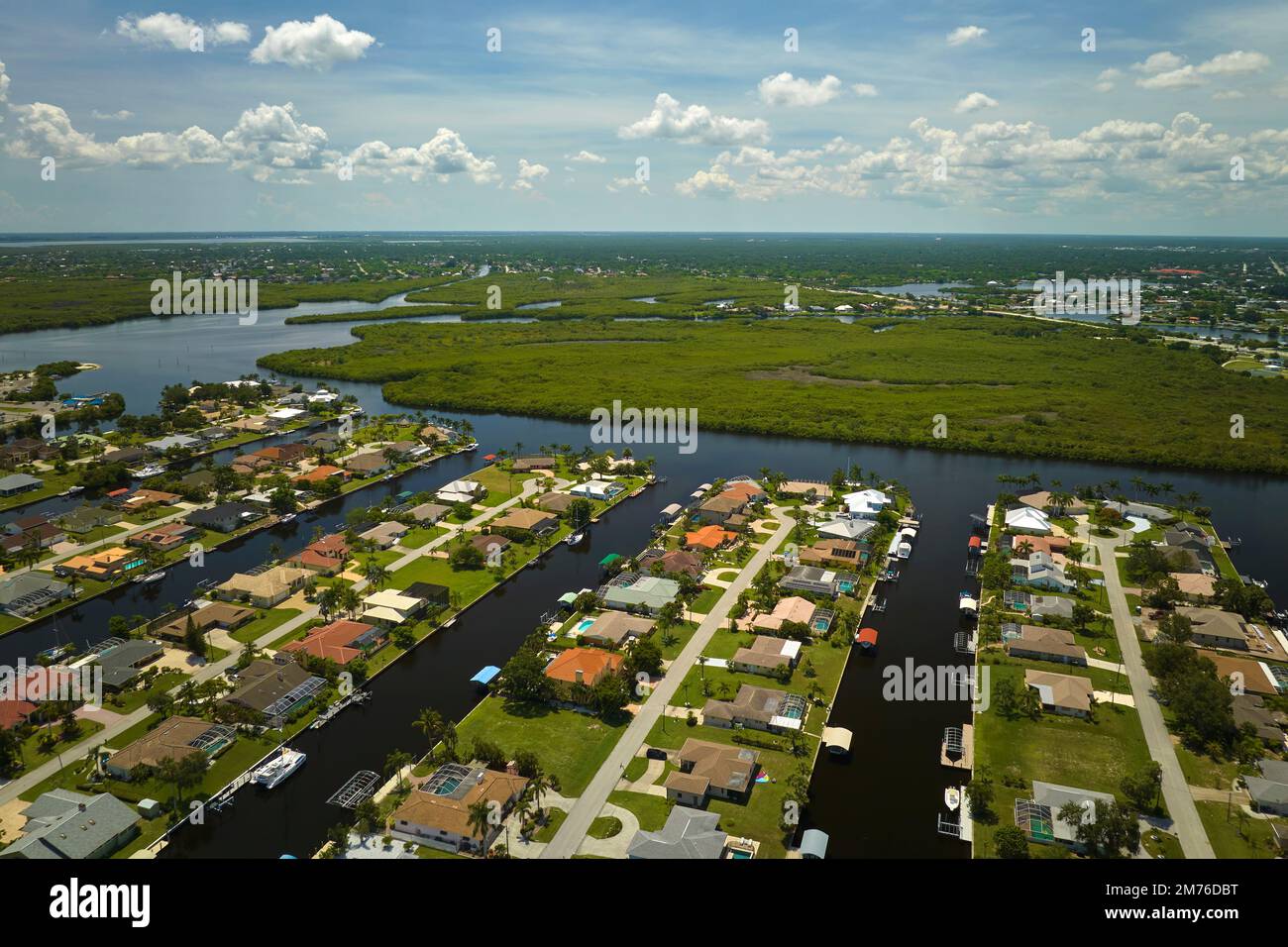 Aerial view of residential suburbs with private homes located near ...
