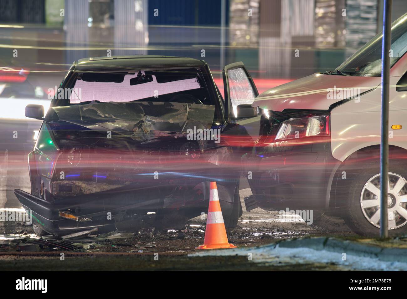 Damaged in heavy car accident vehicles after collision on city street ...