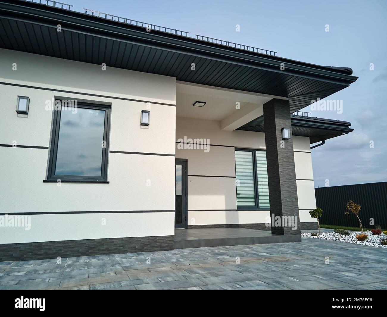 Exterior of modern contemporary comfortable house with front porch ...