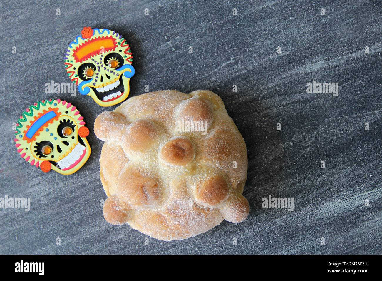 Mexican sweet bread with coffee in a talavera cup, bread of the dead ...
