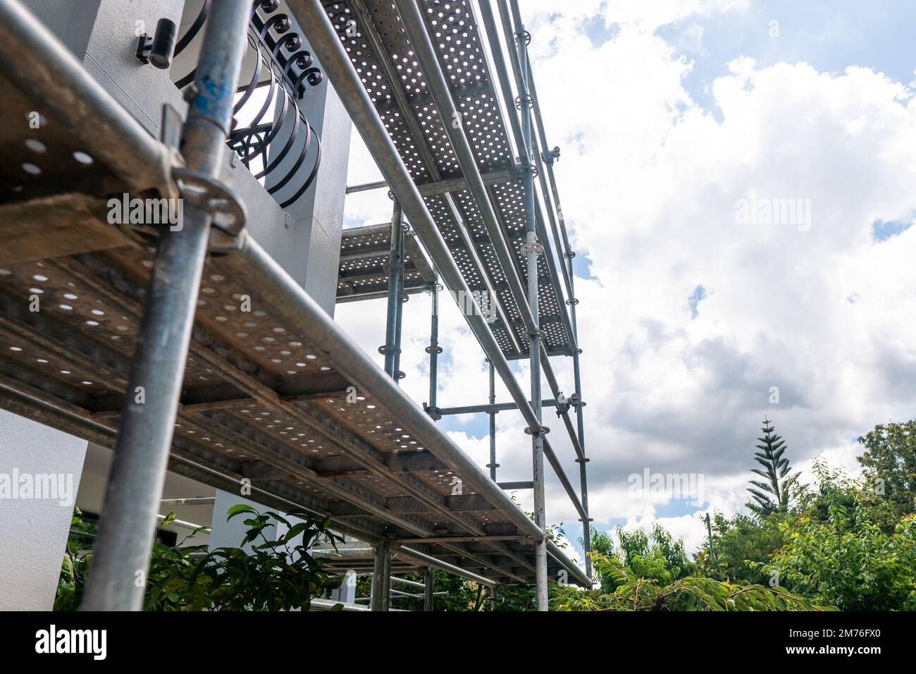 Modern house construction with scaffold pole platform. New build ...