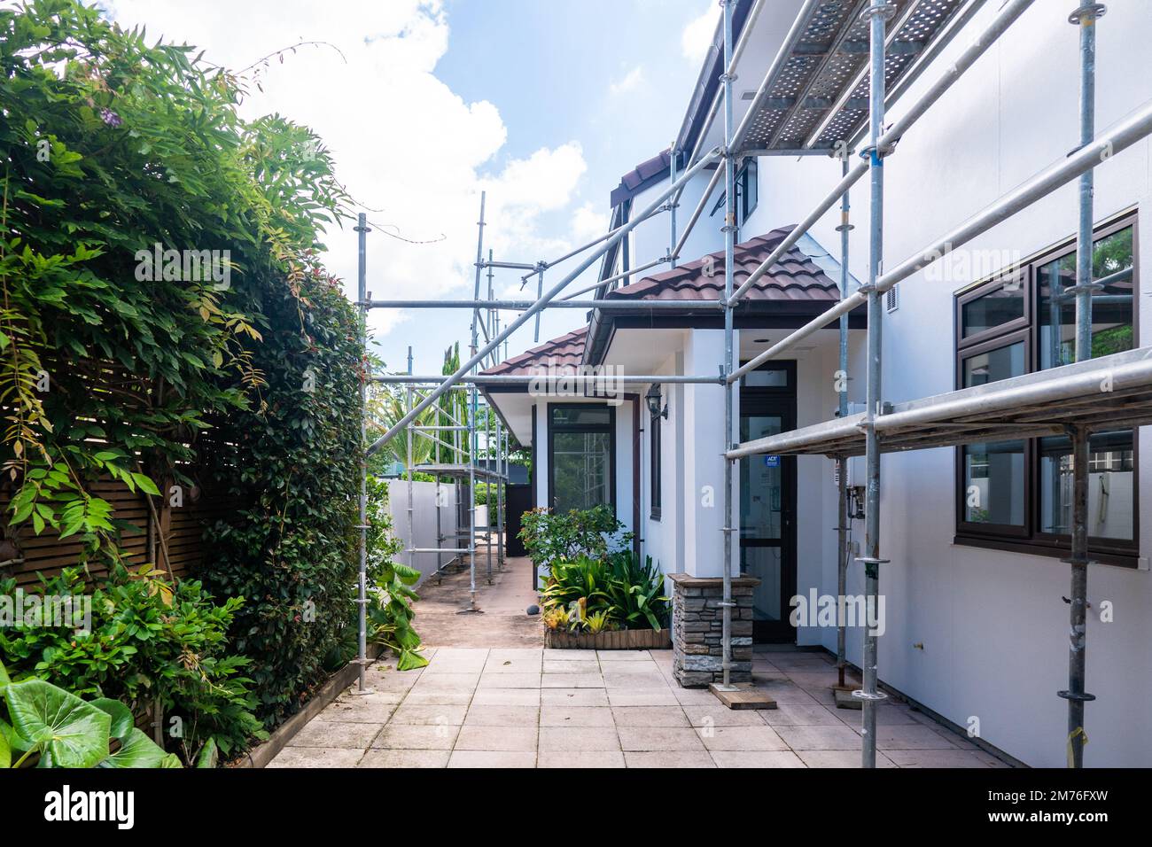 Modern house construction with scaffold pole platform. New build ...