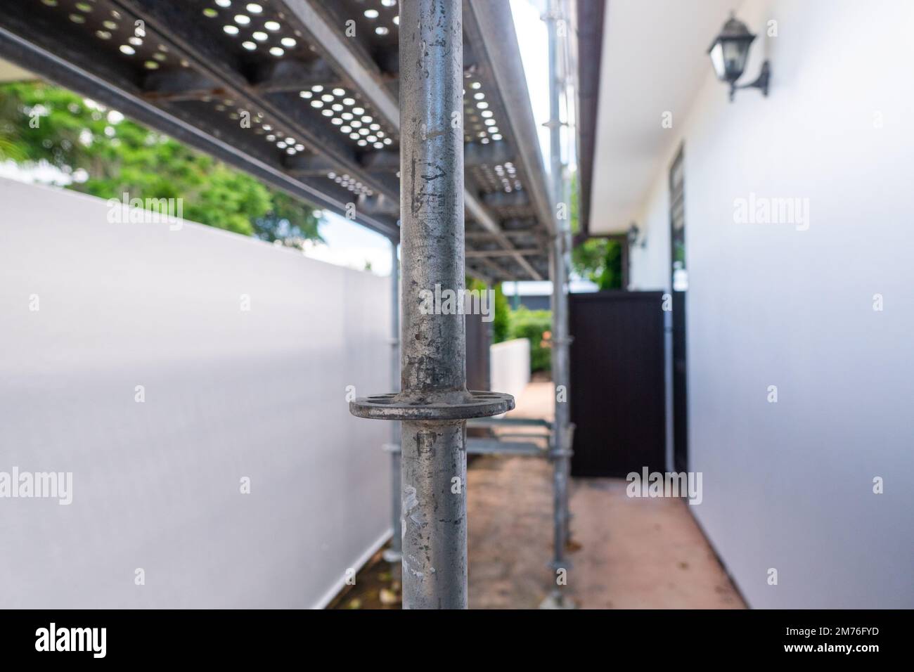 Modern house construction with scaffold pole platform. New build ...