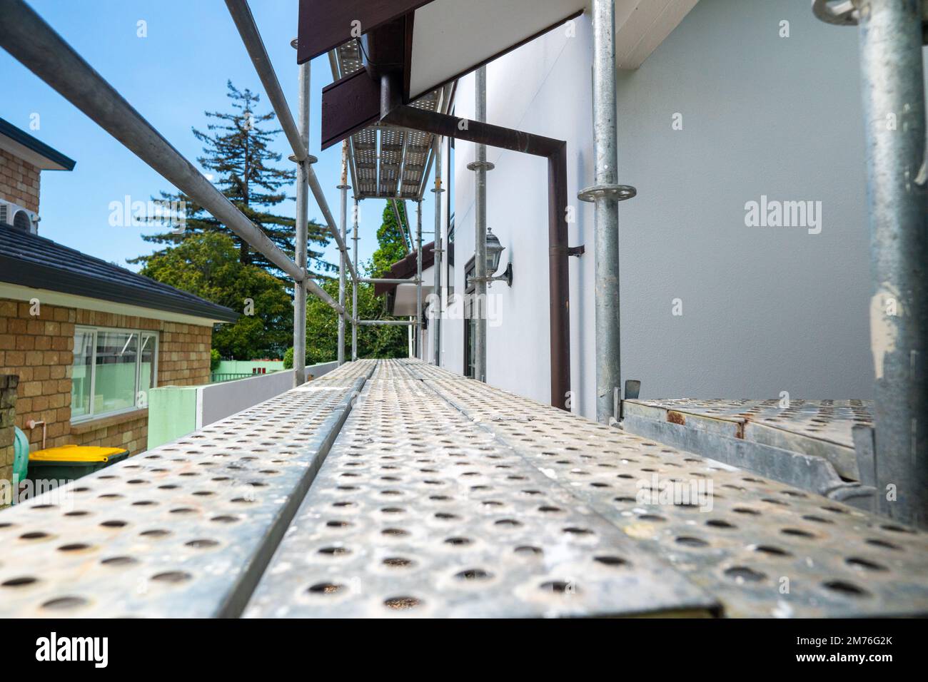 Modern house construction with scaffold pole platform. New build ...