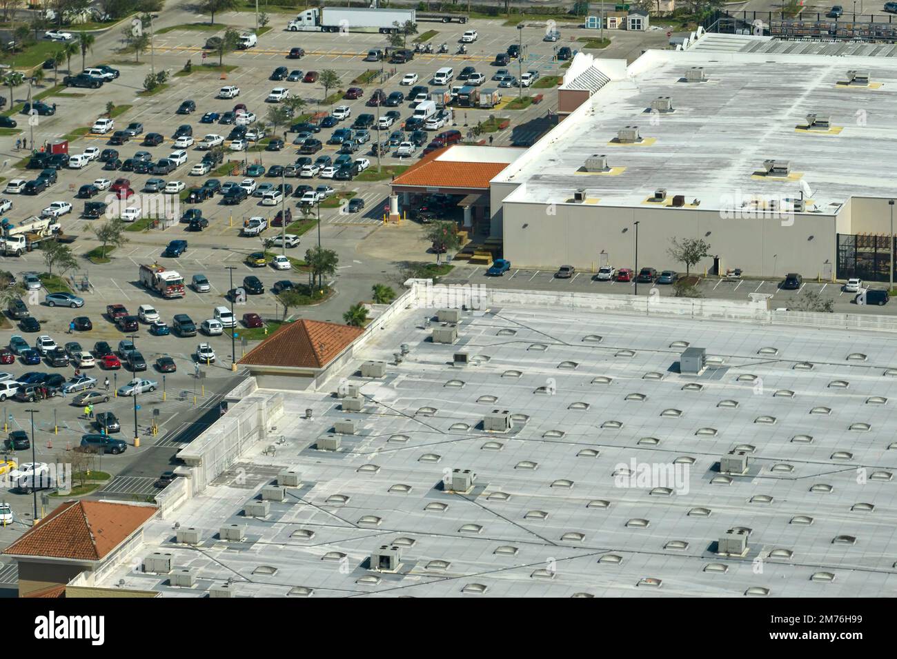 View from above of american grocery store with many parked cars on ...