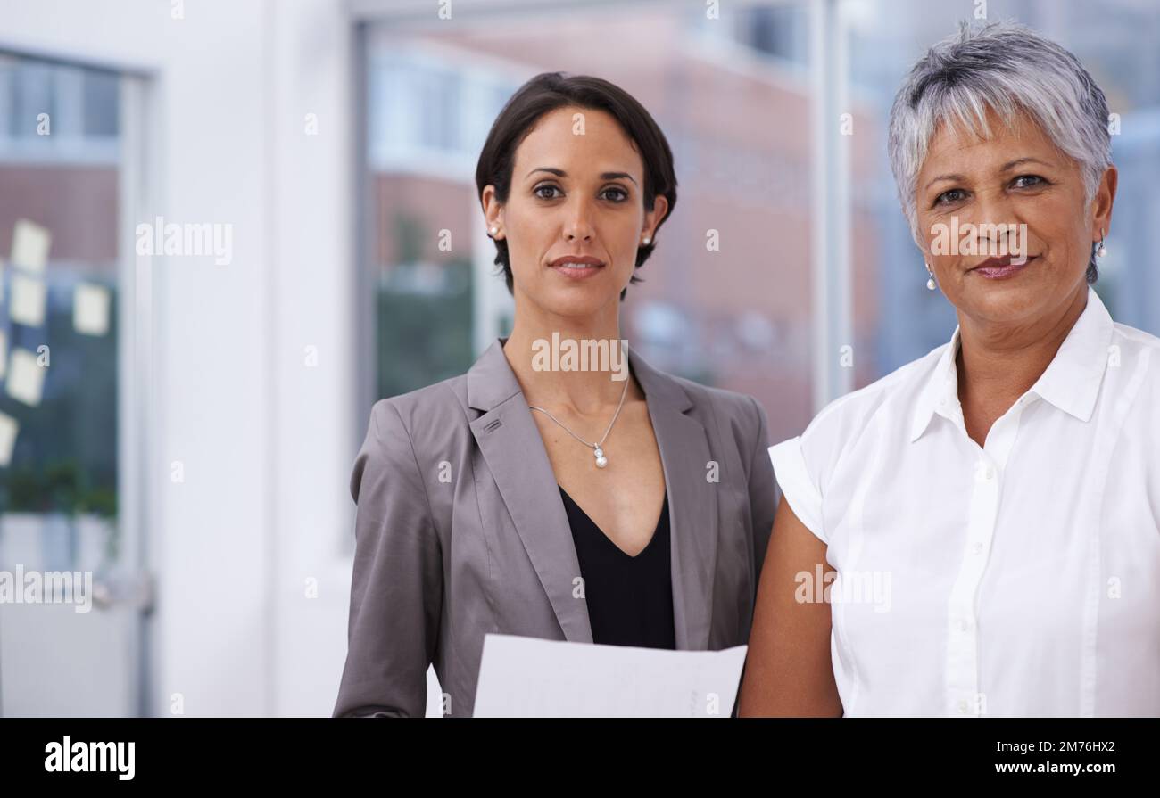 Theyre a dynamic corporate team. Portrait of two businesswomen standing ...