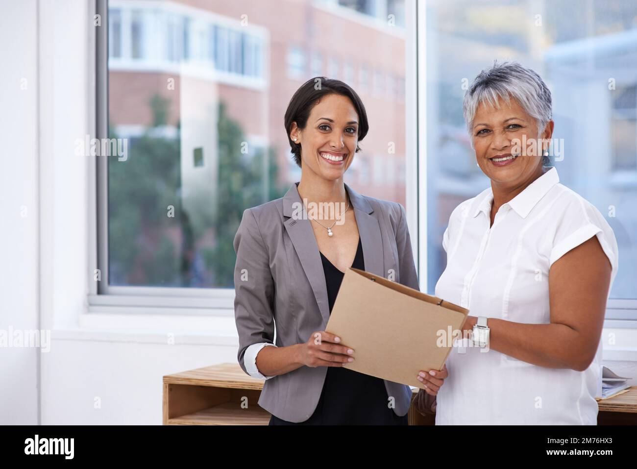 Portrait two female coworkers hi-res stock photography and images - Alamy