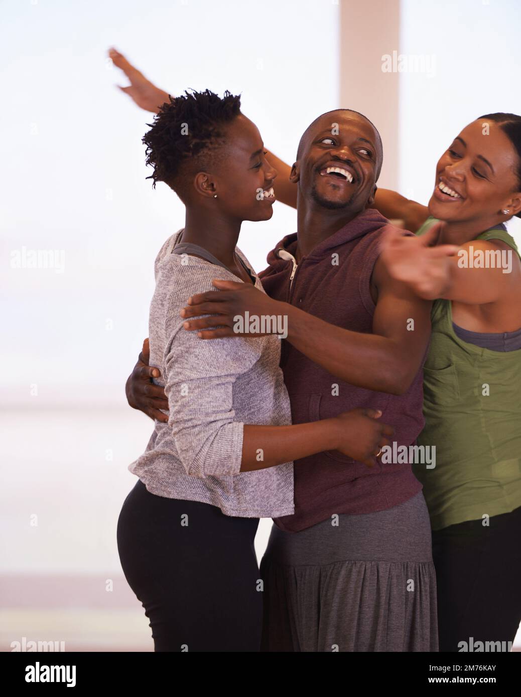 Friends and dance partners. a group of people practicing in a dance ...