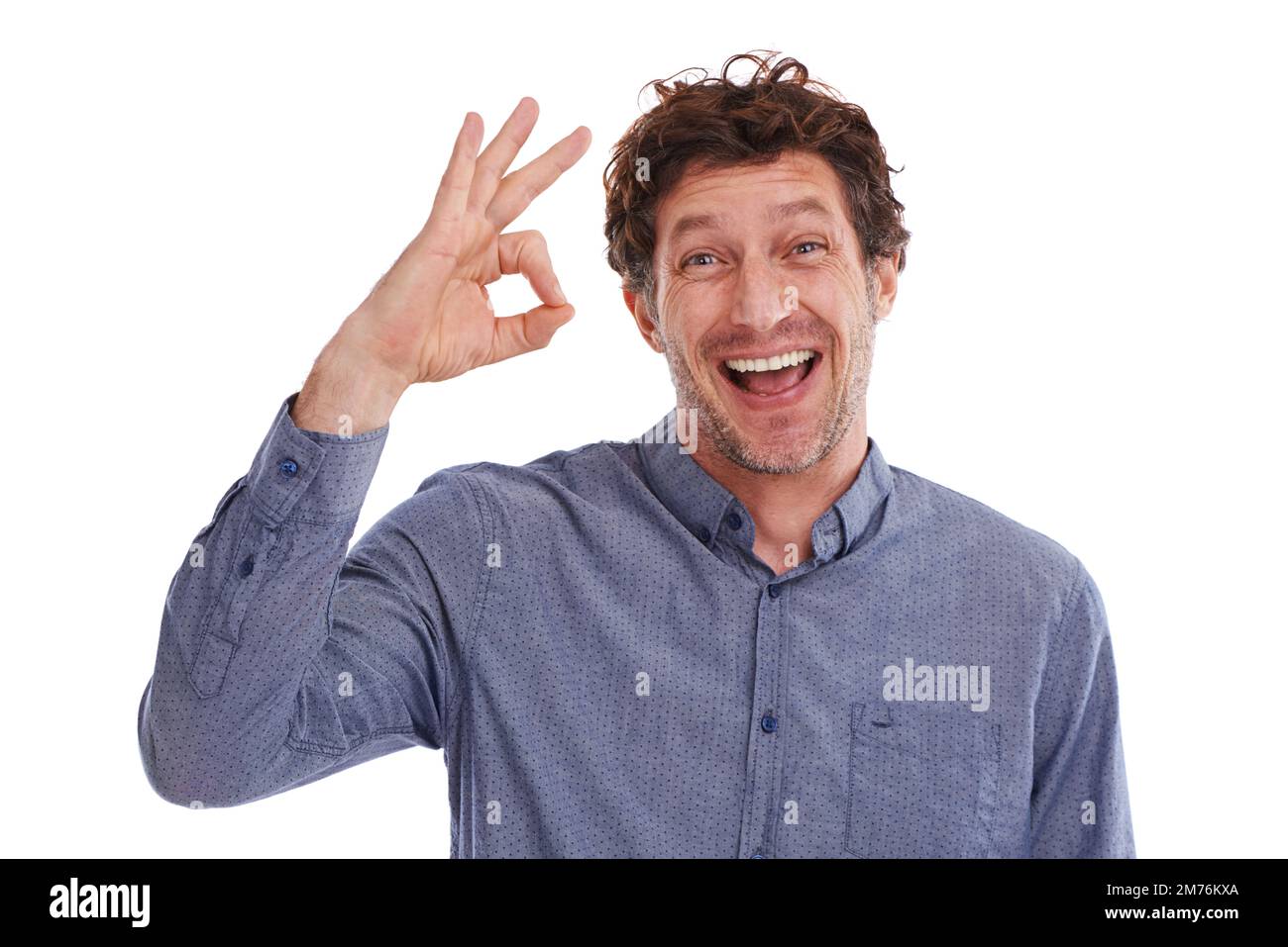Its A-okay people. Studio portrait of a handsome young man showing the ...