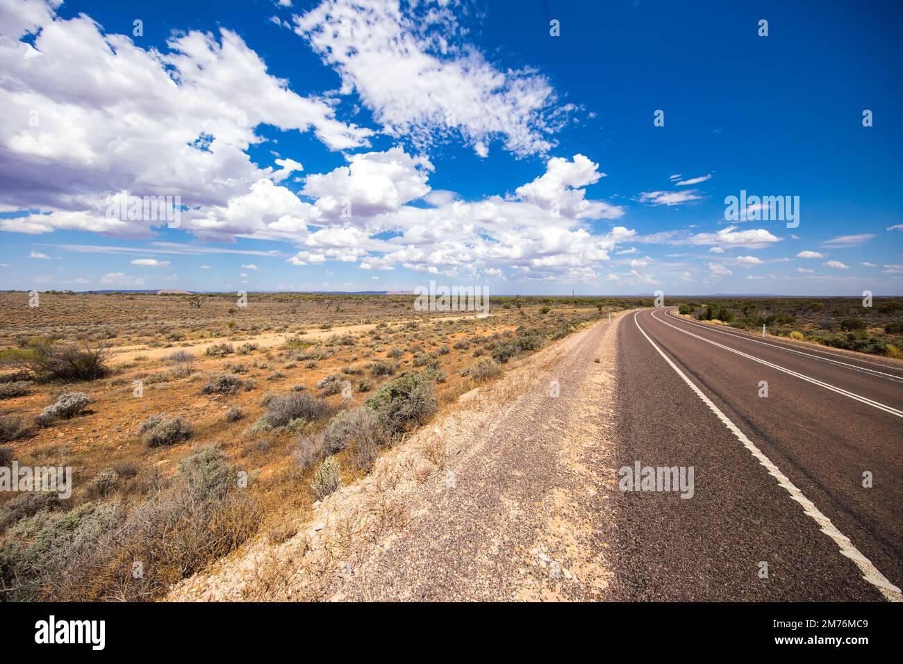 On the road side of the Stuart highway. Along the deserted barren vast ...