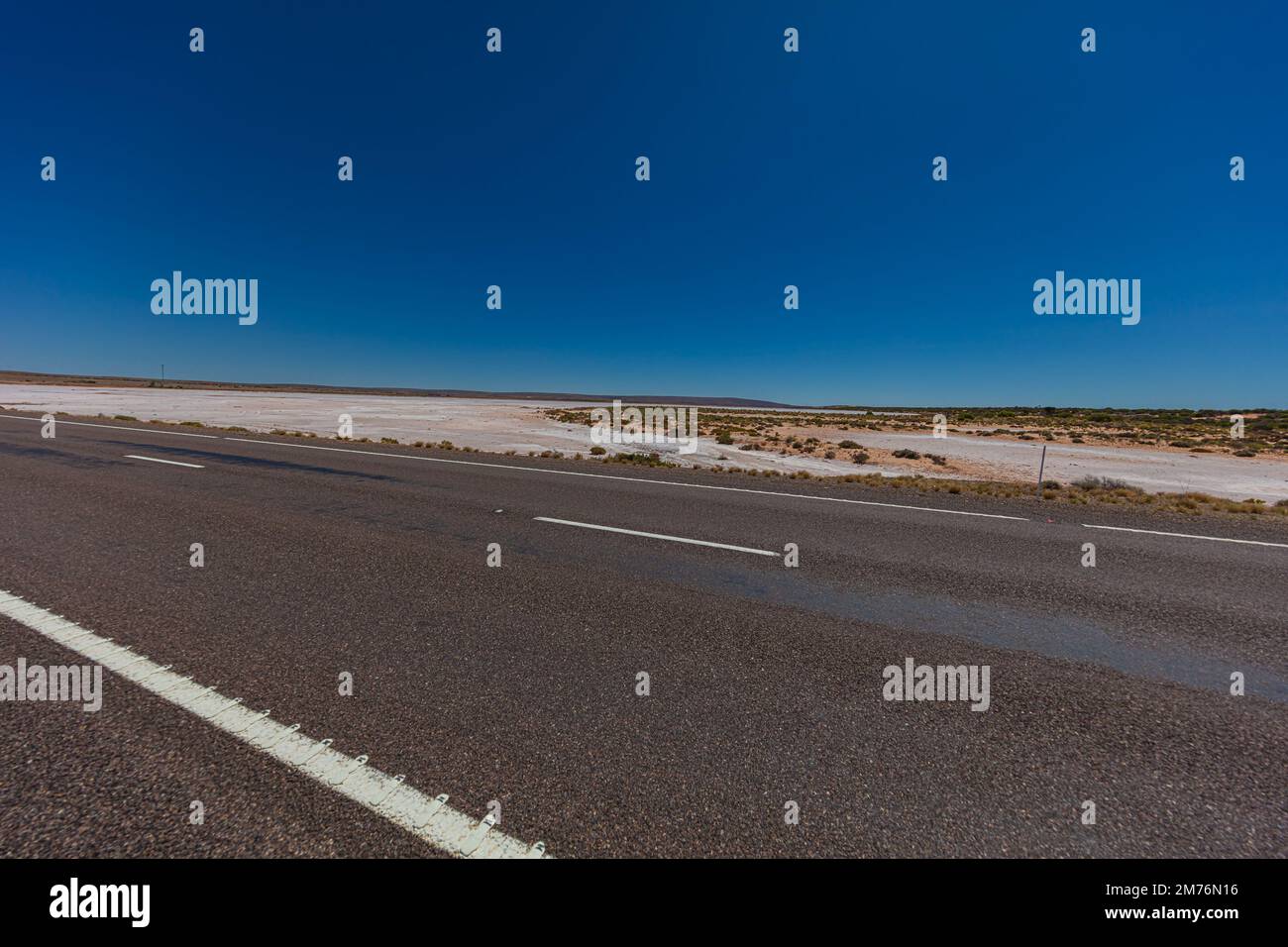 On the road side of the Stuart highway. Along the deserted barren vast ...