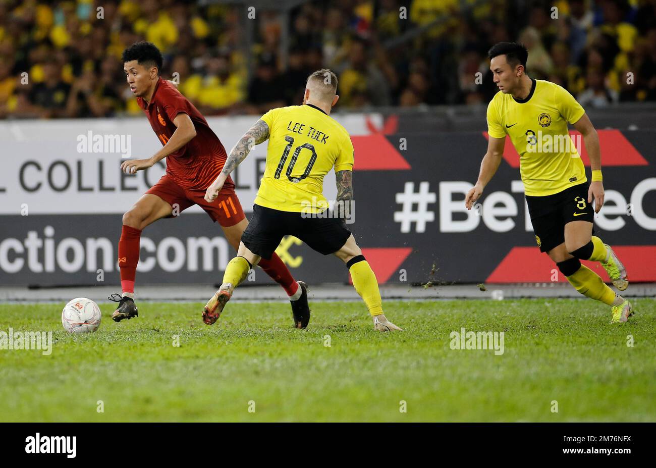Bordin Phala of Thailand (L) and Tuck Lee Andrew (C), Quentin Cheng ...