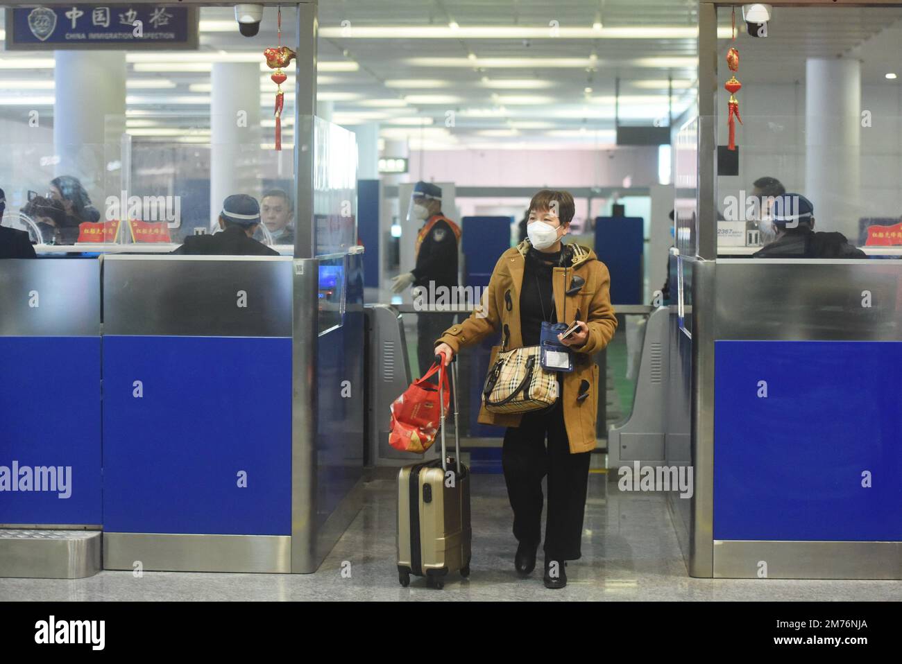 HANGZHOU, CHINA - JANUARY 8, 2023 - Passengers on international flights ...