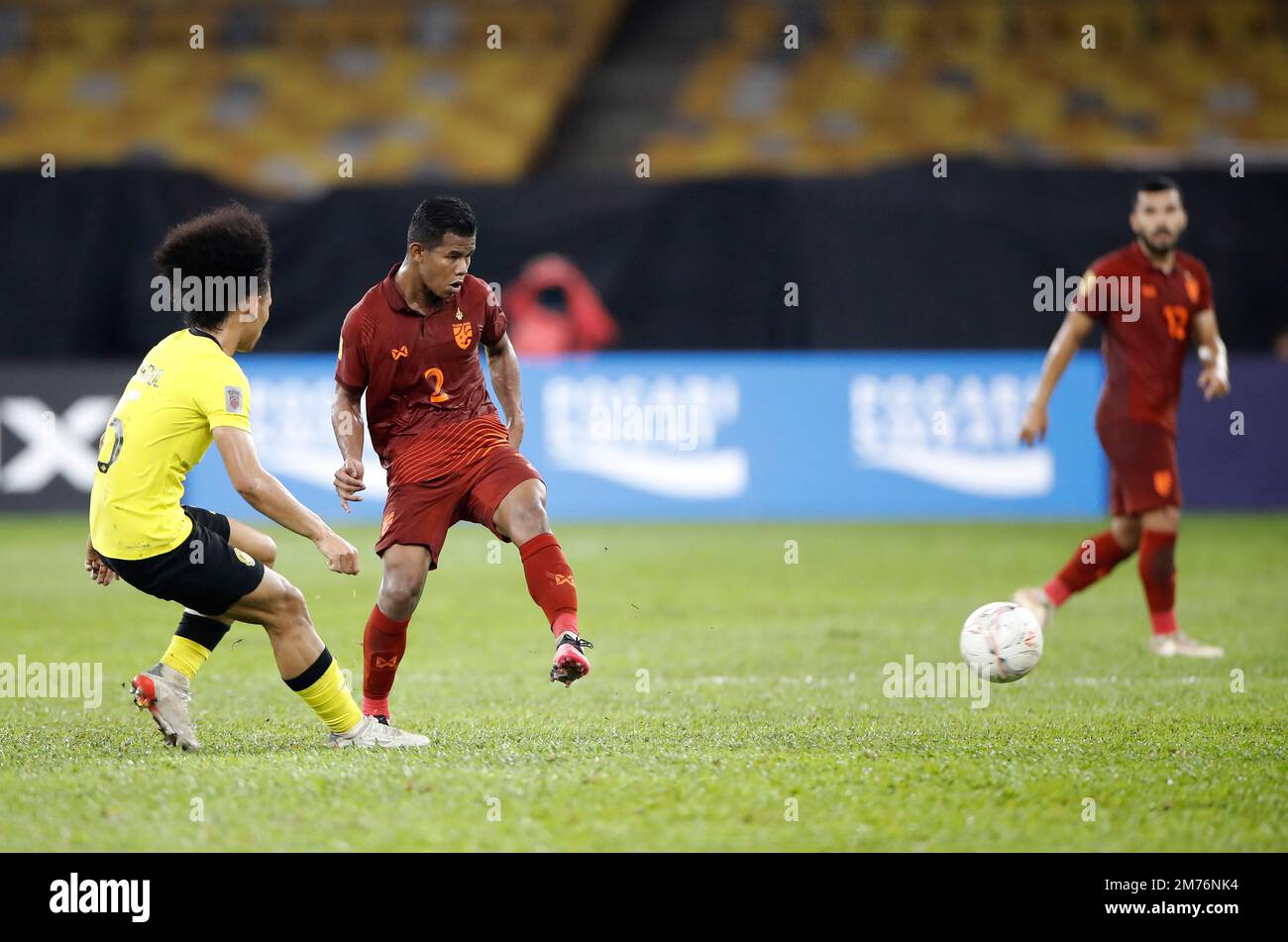 Sasalak Haiprakhon of Thailand (R) and Dominic Tan Jun Jin of Malaysia ...
