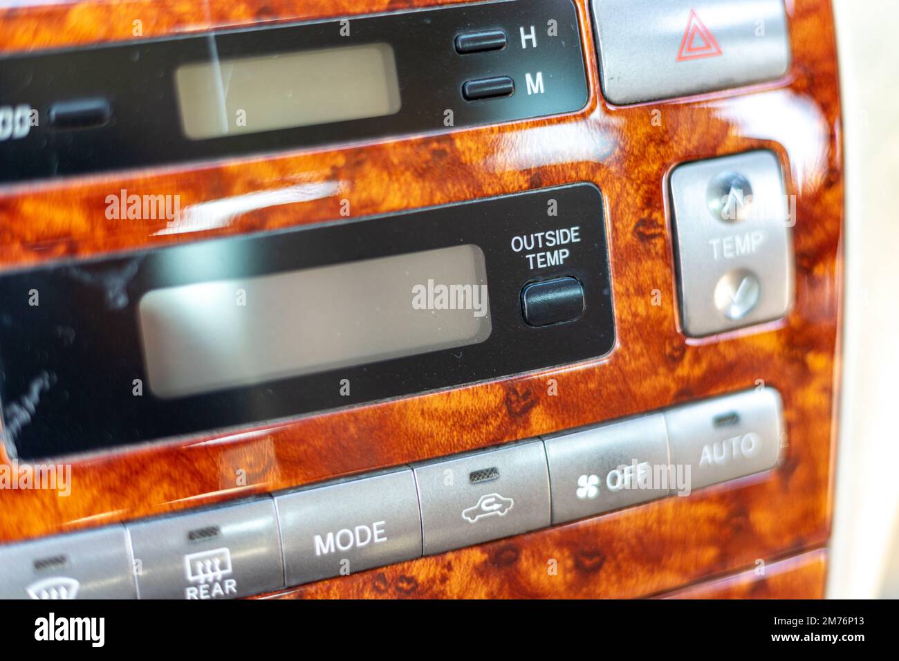 Closeup of a outside temperature button on a car's dashboard Stock ...