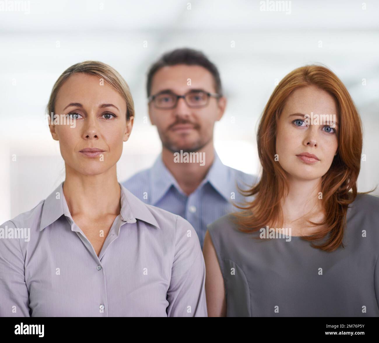 Competition in the workplace. Cropped portrait of a team of ...