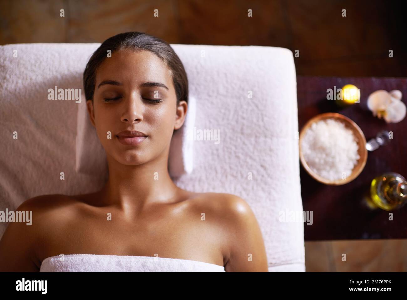 Let your troubles drift away...a beautiful young woman relaxing during ...