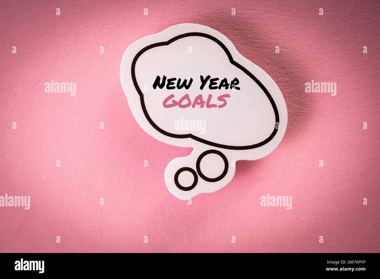 New Year Goals. Speech bubble with text on pink background Stock Photo ...