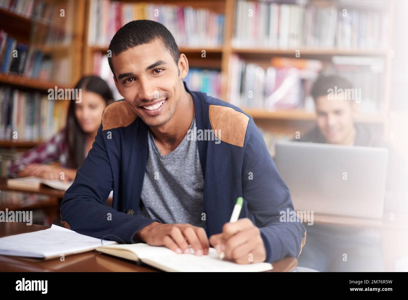 Working diligently handsome young hi-res stock photography and images ...