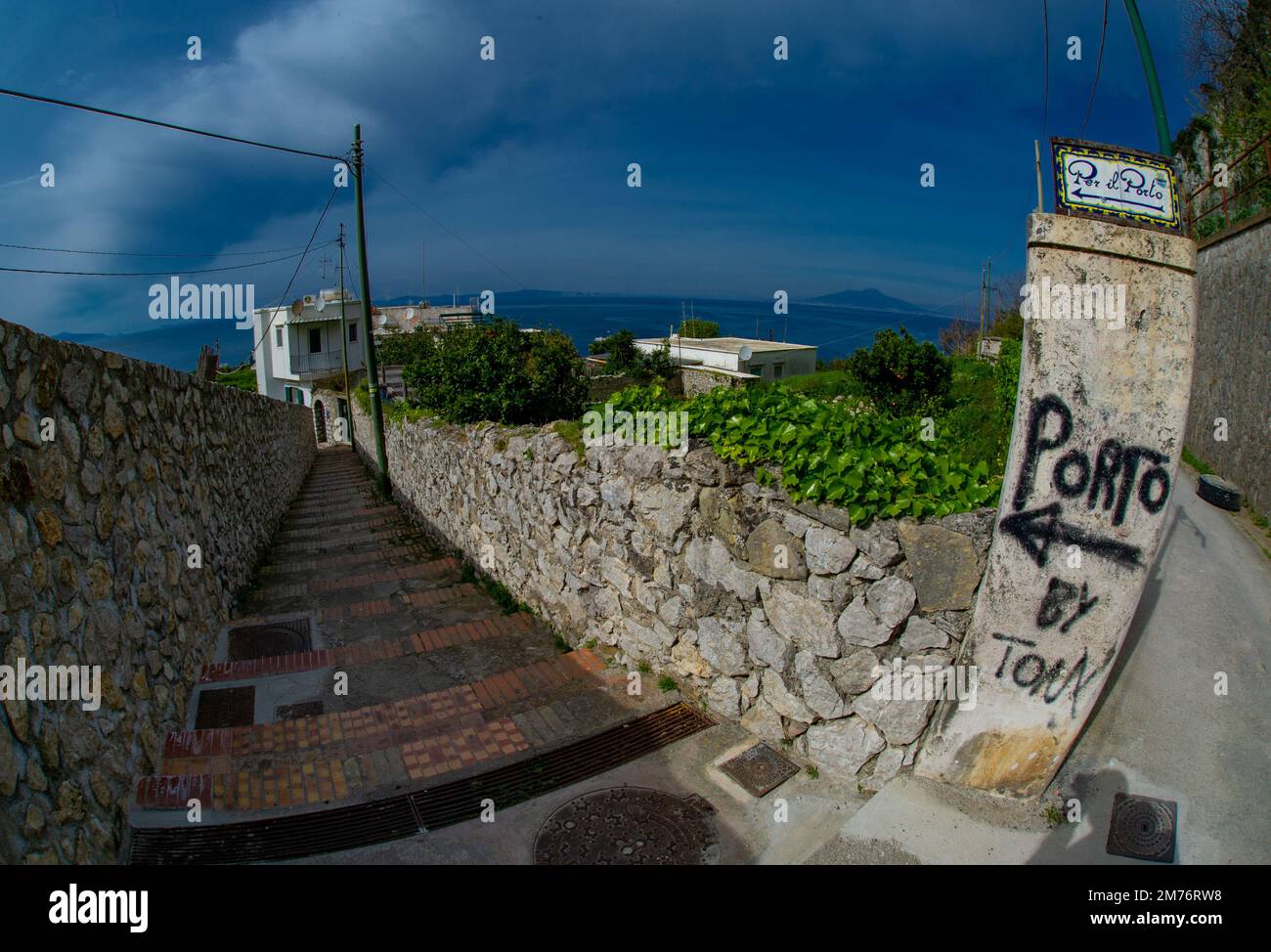 View from a cliff on the island of Capri, Italy, and rocks in the sea ...