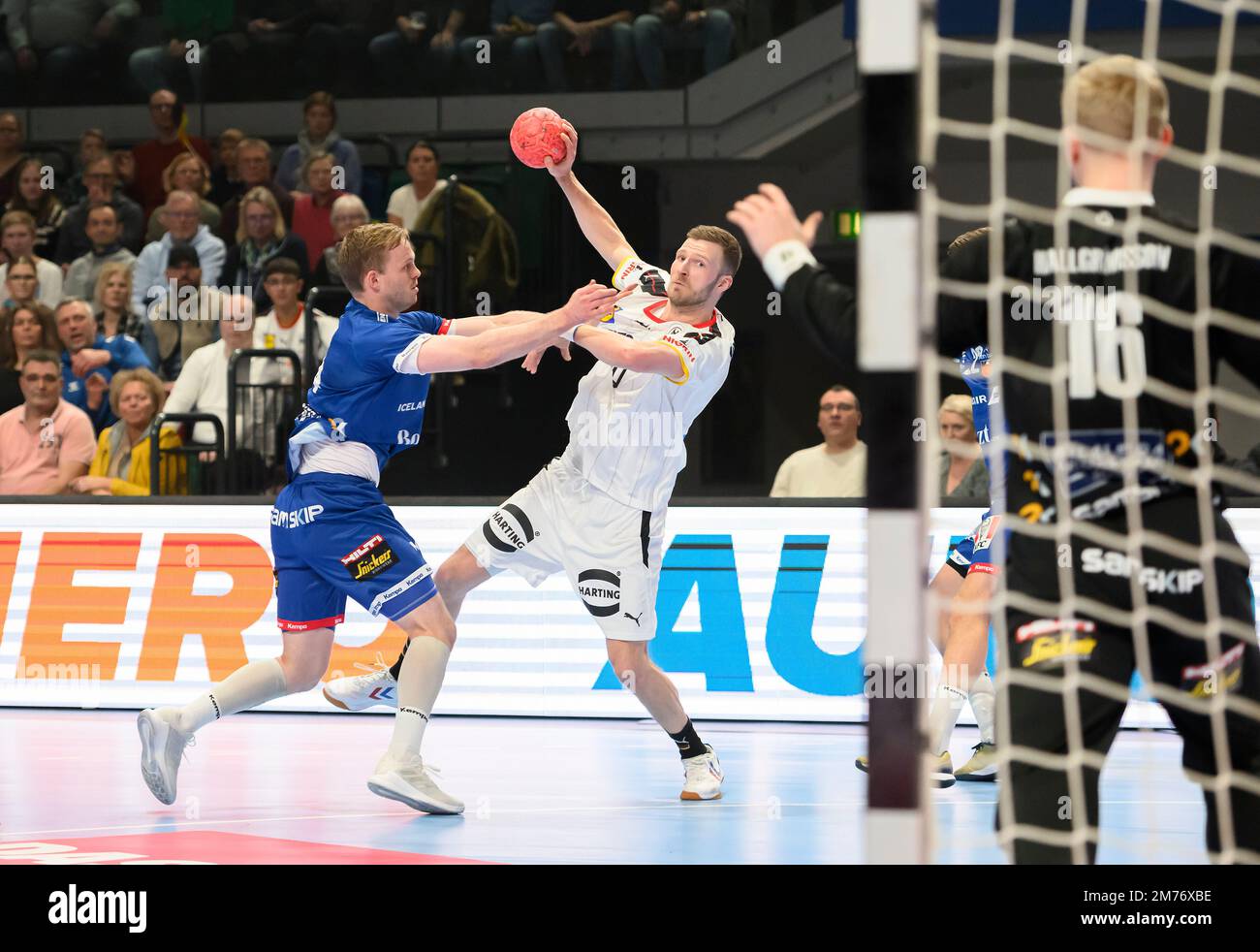 left to right Omar Ingi MAGNUSSON (ISL), Philipp WEBER (GER), action ...