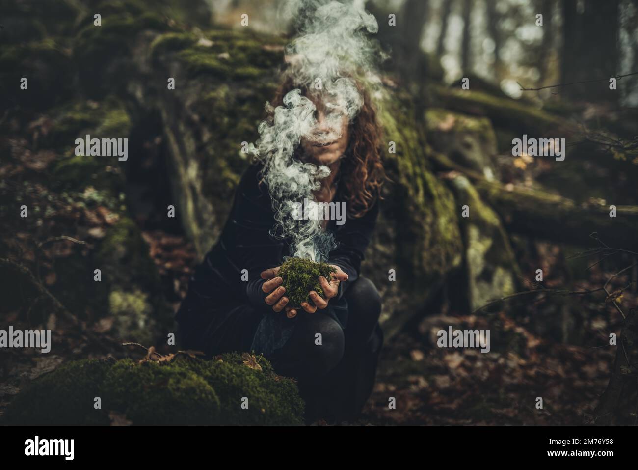 Shaman woman and incense in her hands, incense in a woman hand ...