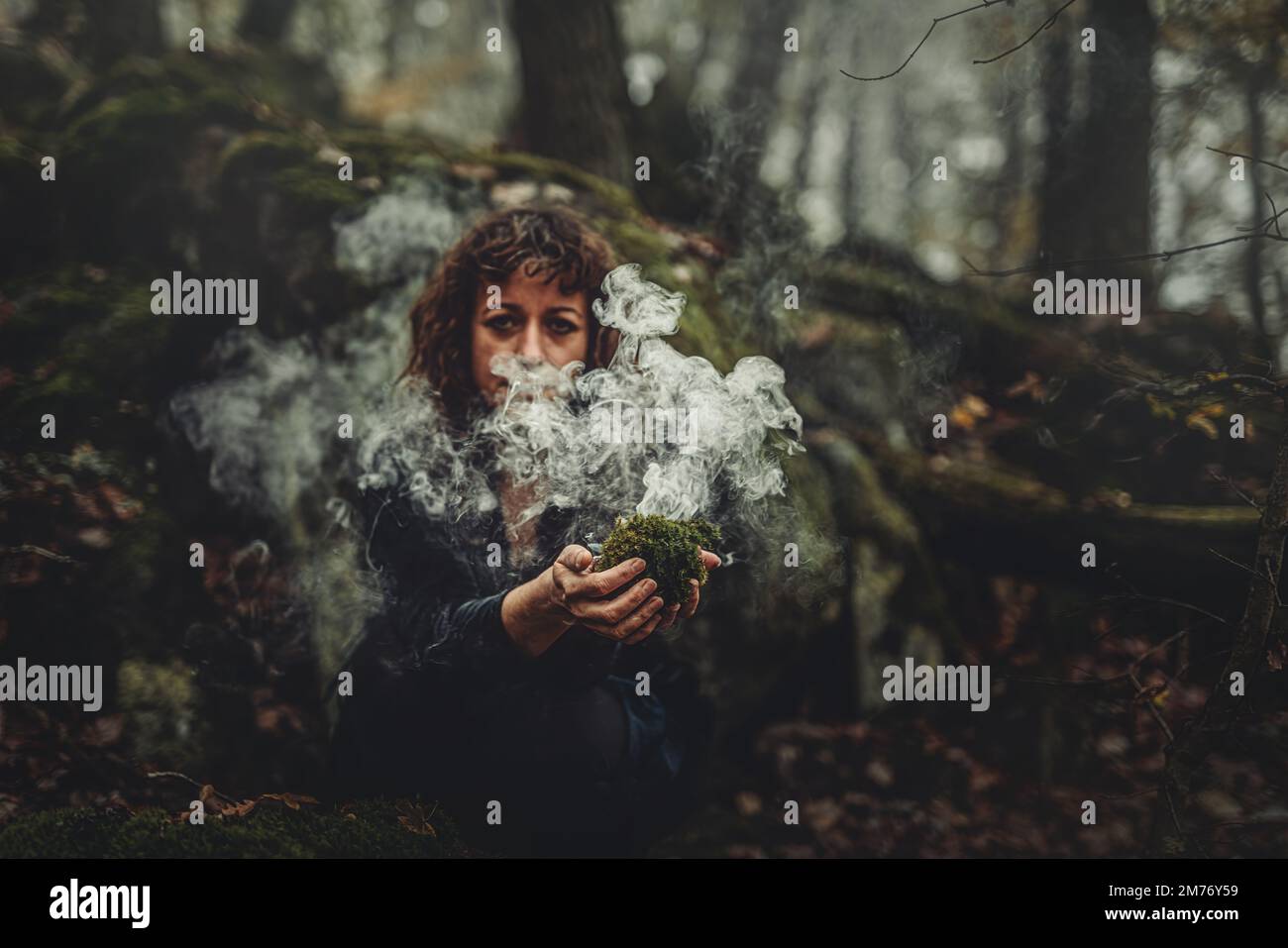 Shaman woman and incense in her hands, incense in a woman hand ...