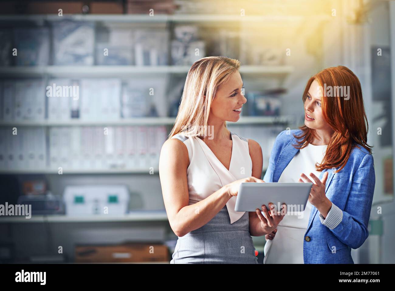 Its called wireless success. two businesspeople working on a digital ...