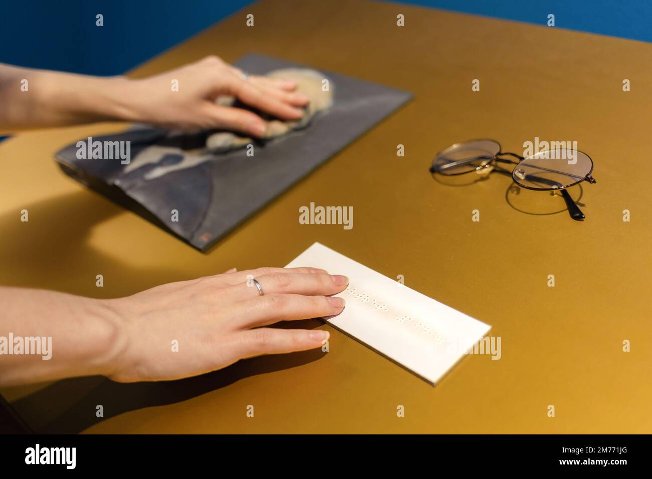 Female hands touches exposition in museum. Convex exhibit for visually ...