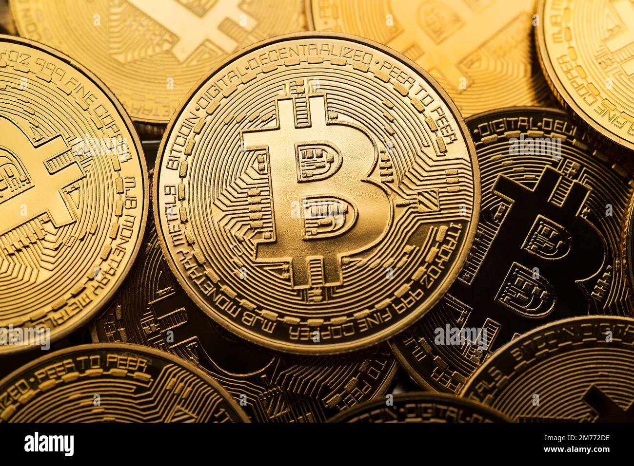 Golden coins with bitcoin symbol close up. Bitcoin and cryptocurrency ...