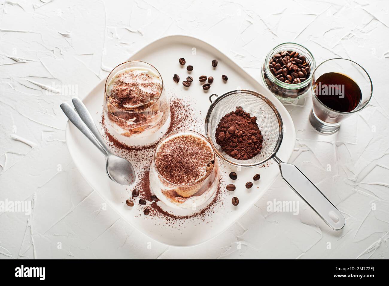 Traditional Italian dessert tiramisu in a glass cup. Homemade tiramisu ...