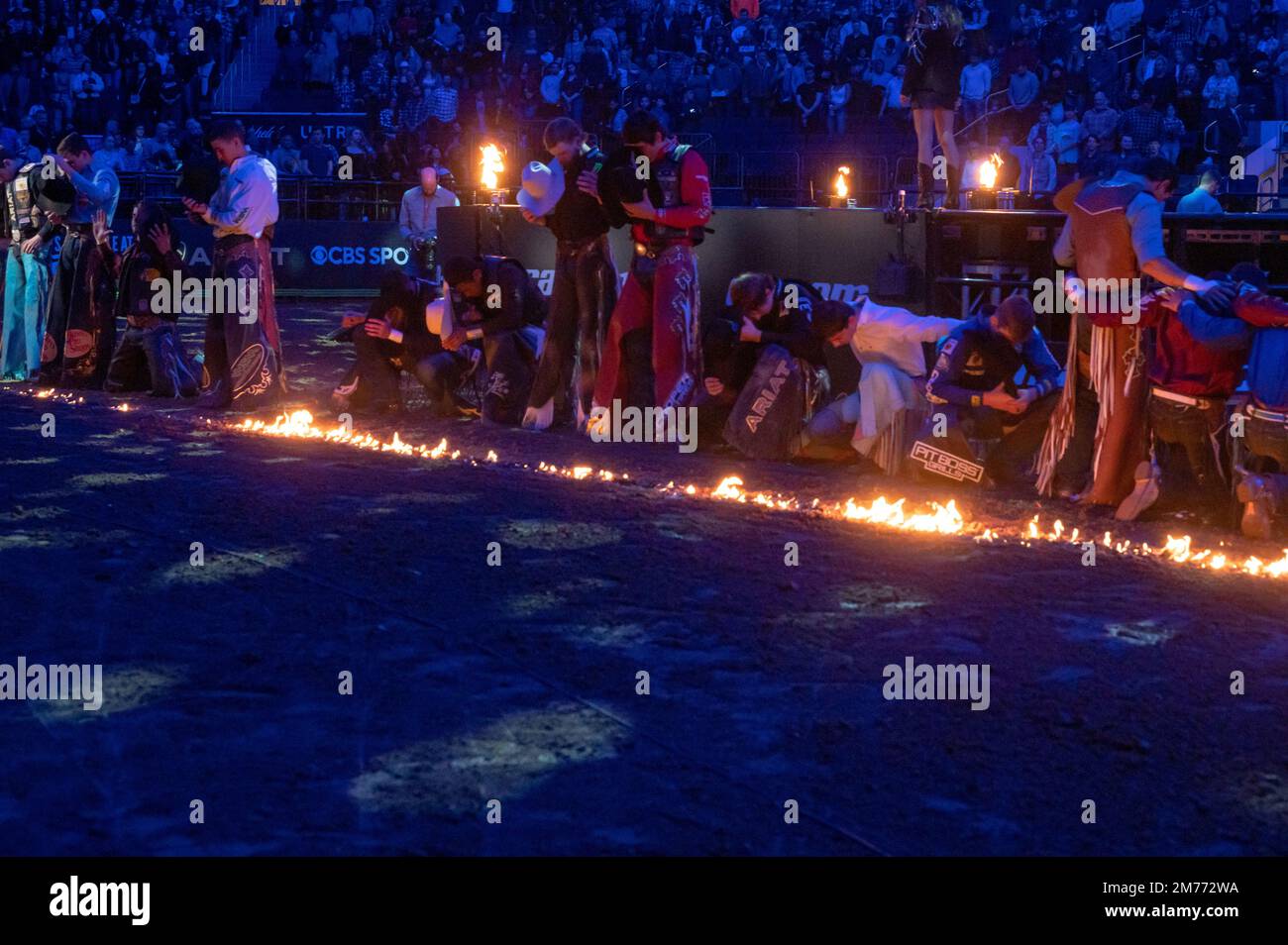 NEW YORK, NEW YORK - JANUARY 07: Bull riders pray during the opening ...