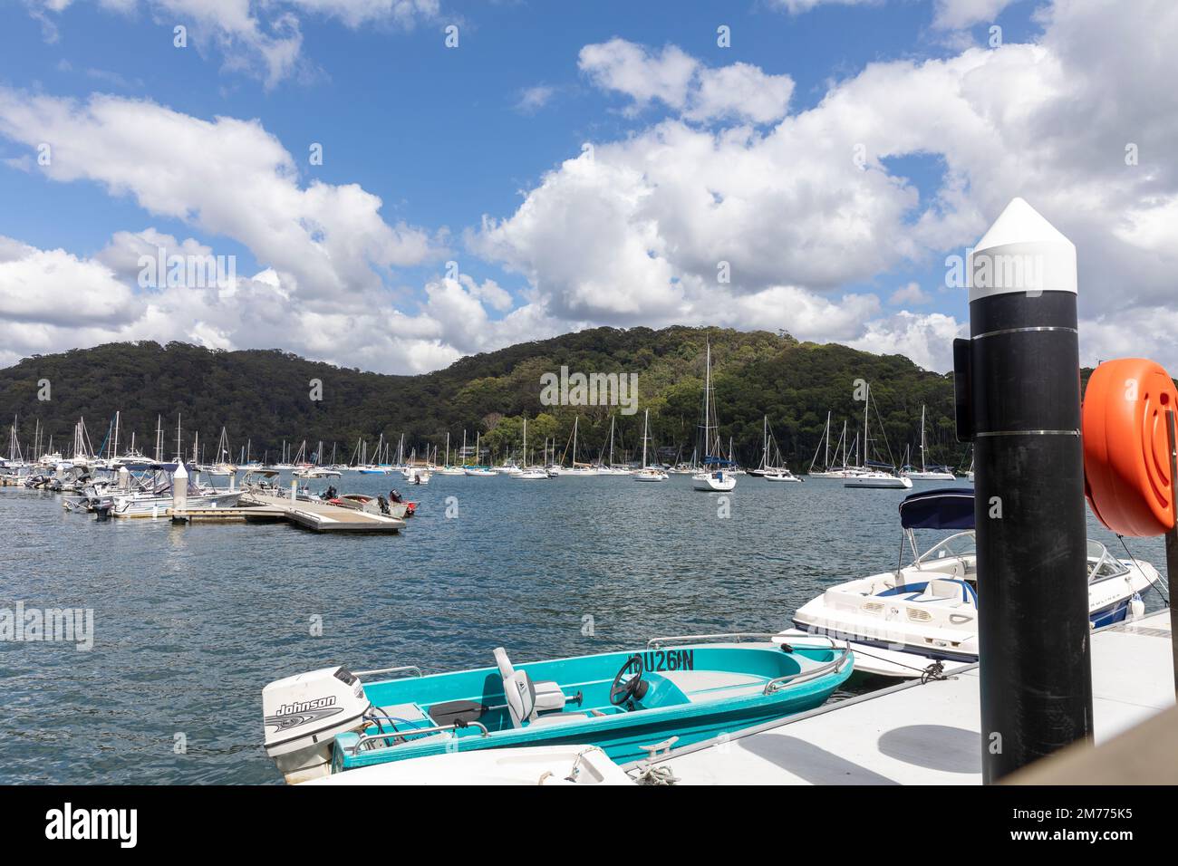 Small commuter boats berthed at Church Point Commuter wharf, on ...