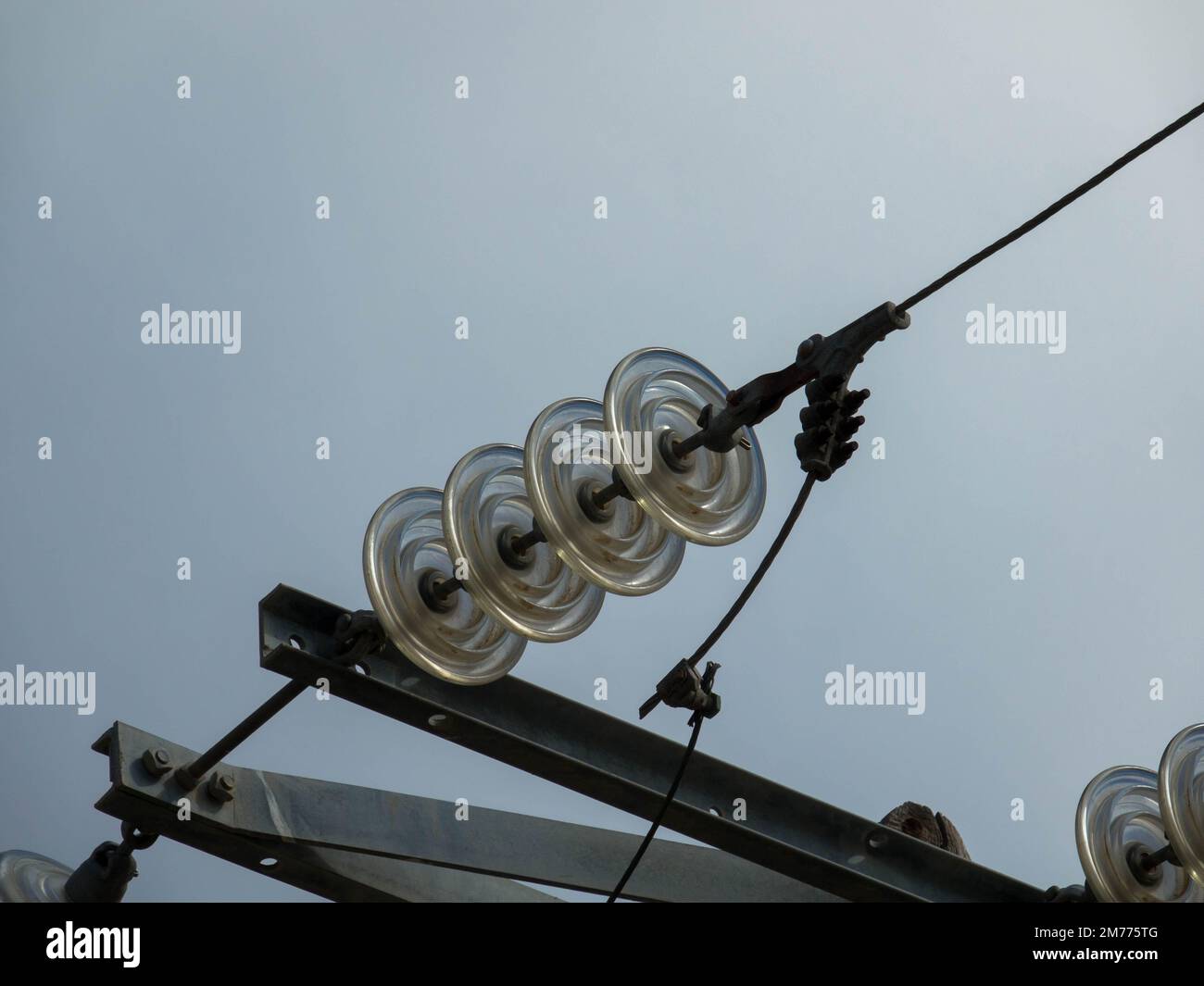 Close up of high-voltage insulating support of a transmission line ...
