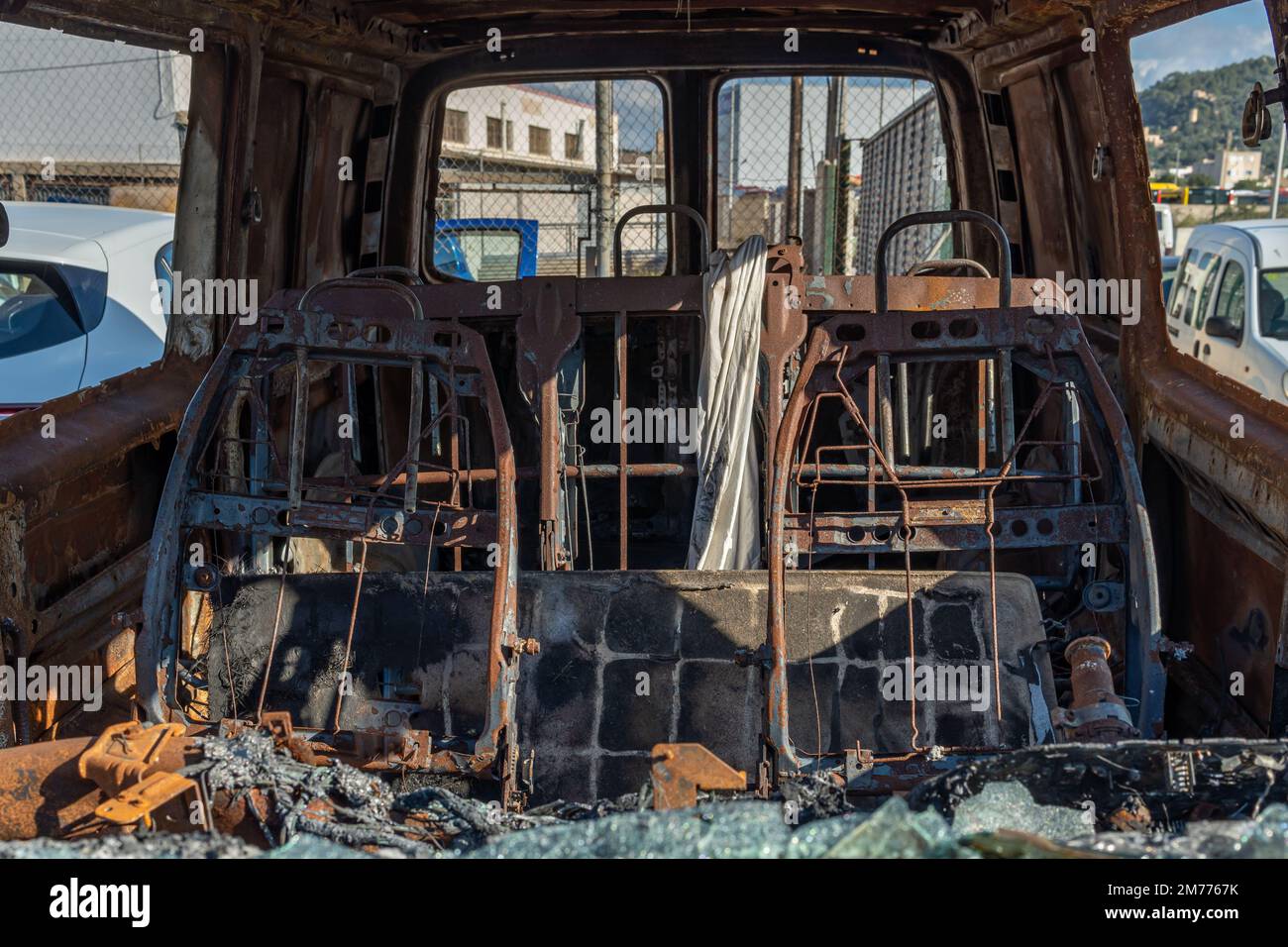Abandoned old van in a state of ruin after having been burned ...