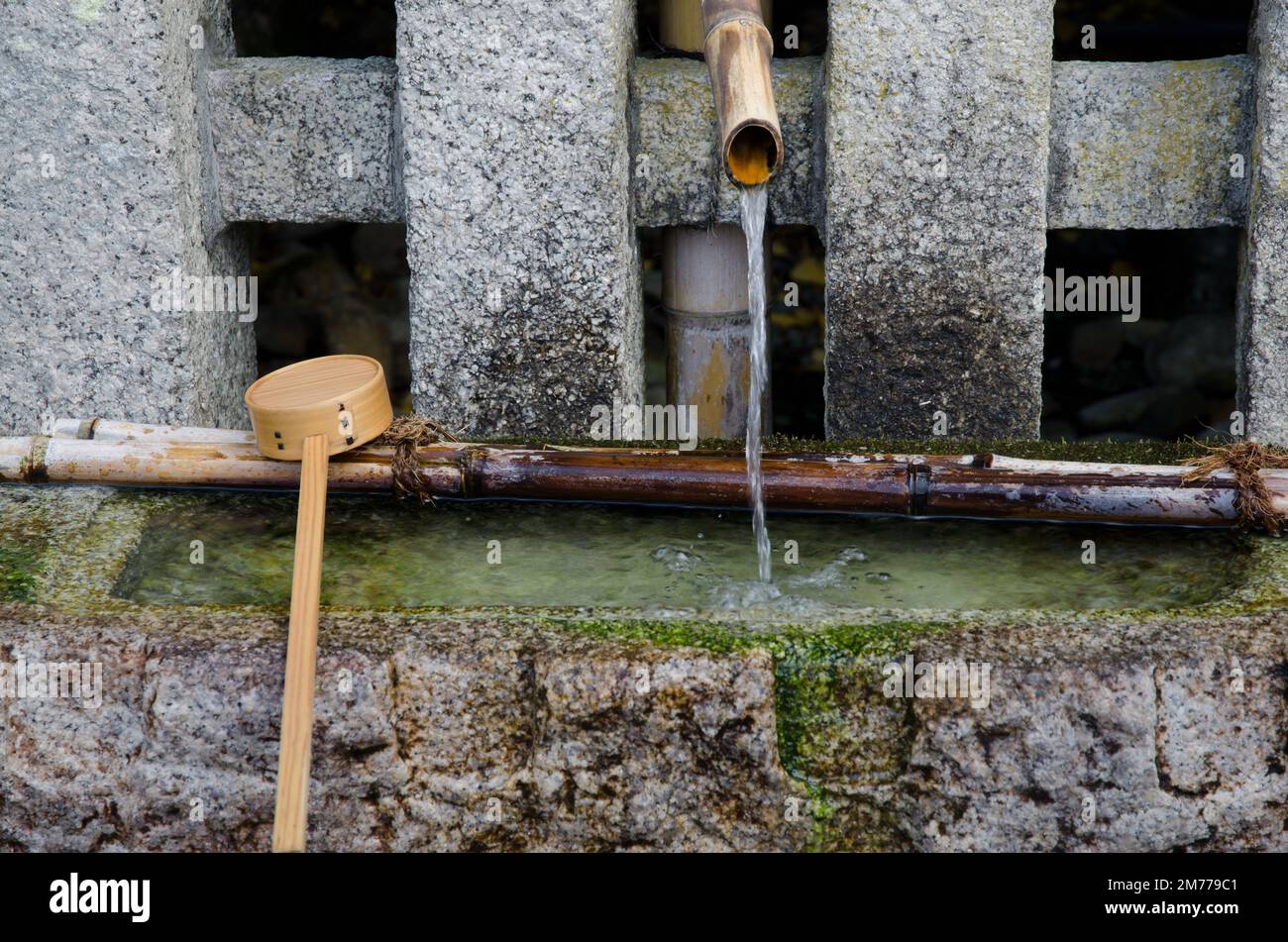 Traditional fountain for ablution in the Shimogamo Shrine. Shimogamo ...