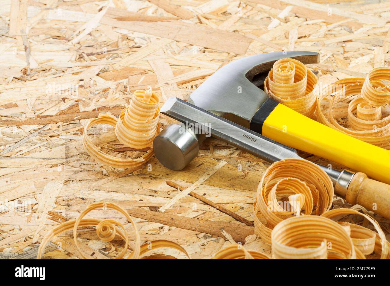 claw hammer and chisel on plywood Stock Photo - Alamy