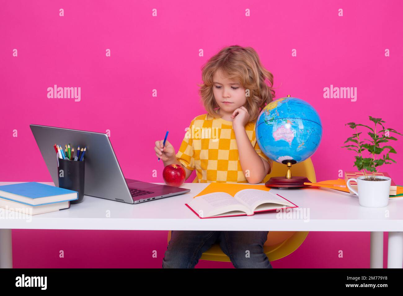 Little student school child isolated on studio background. Portrait of ...