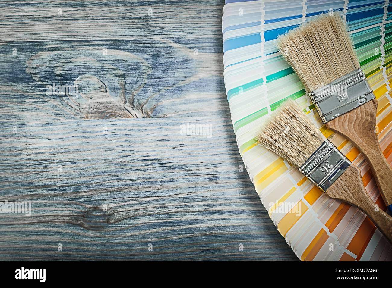 Color palette paint brushes on wooden board copy space construction ...