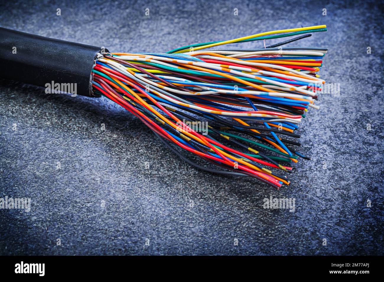 Multicolored electric wires on black background electricity concept ...