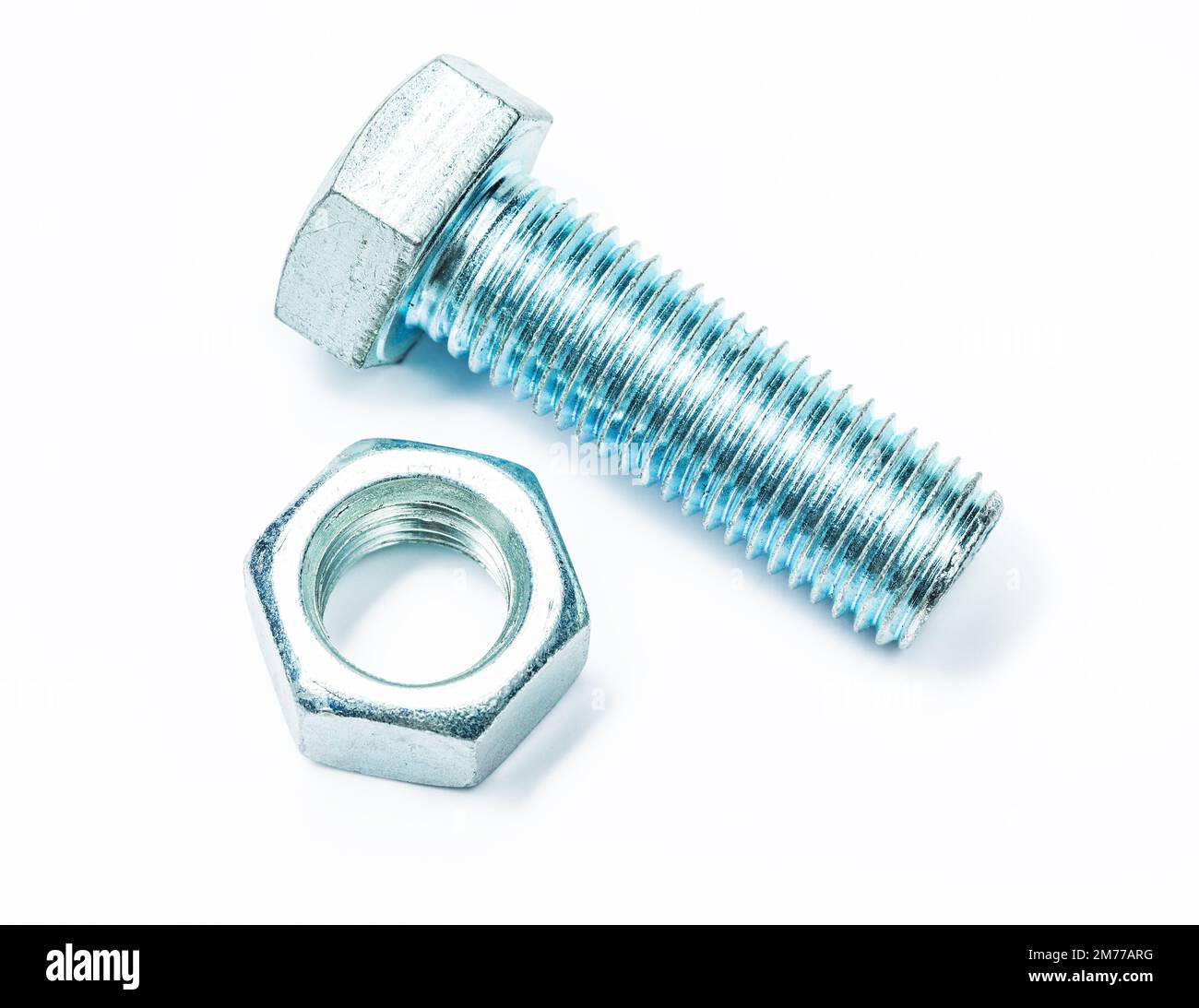 metalic bolt with nut isolated on white background Stock Photo - Alamy