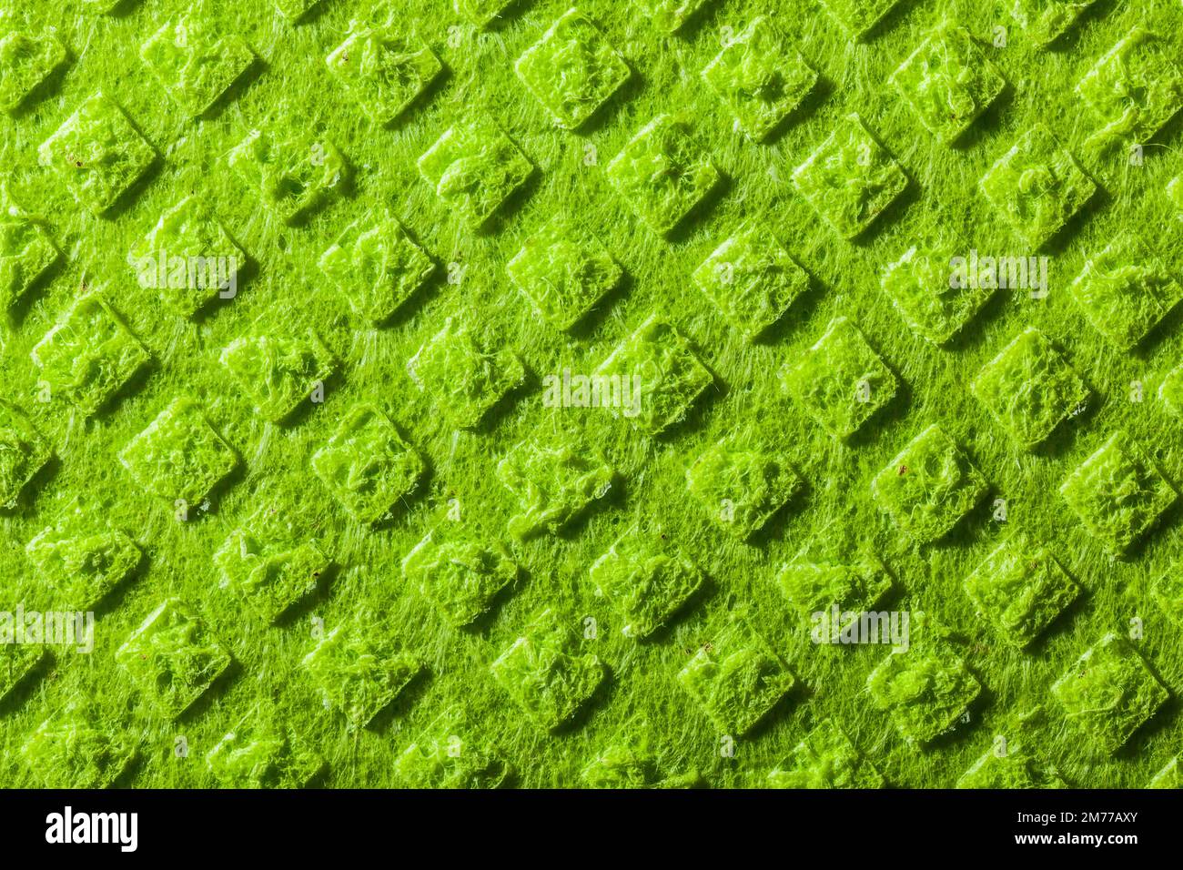 New green kitchen dishcloth background Stock Photo - Alamy