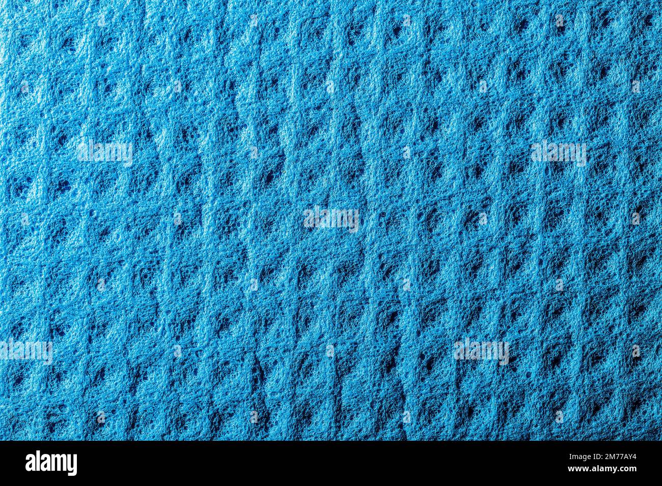 New blue kitchen dishcloth surface Stock Photo - Alamy