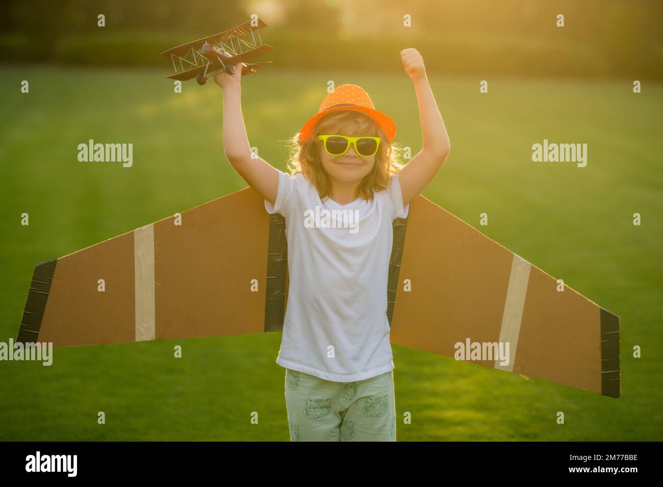 Child freedom and carefree. Happy child playing outdoor. Kid having fun ...