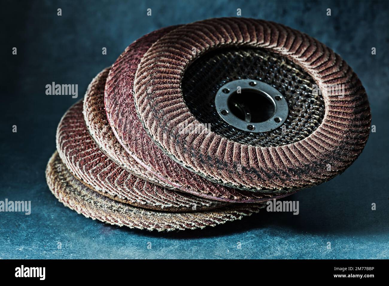 old used abrasive flap discs on metalic background Stock Photo - Alamy