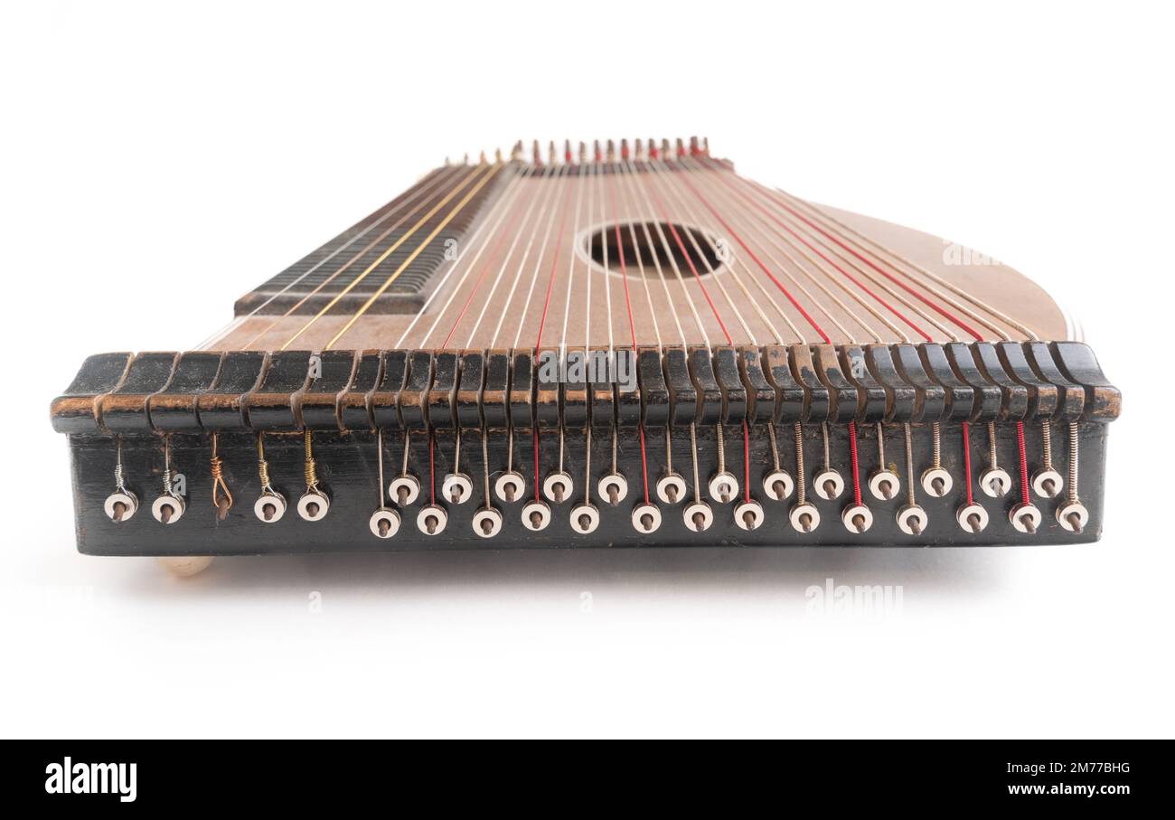 High angle closeup horizontal studio shot of vintage, old wooden zither ...
