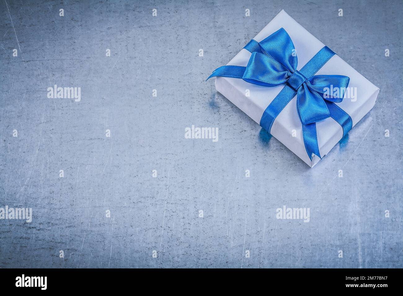 Packed present box on metallic background celebrations concept Stock ...