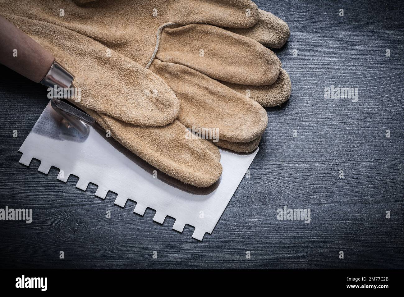 pair gloves steel putty knife Stock Photo - Alamy