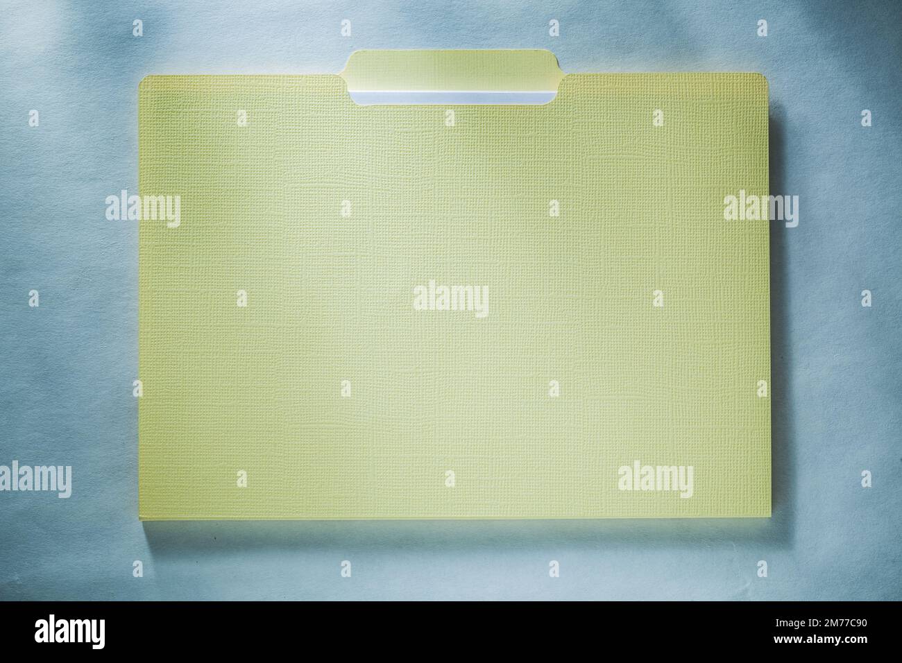 Paper folder on white background Stock Photo - Alamy